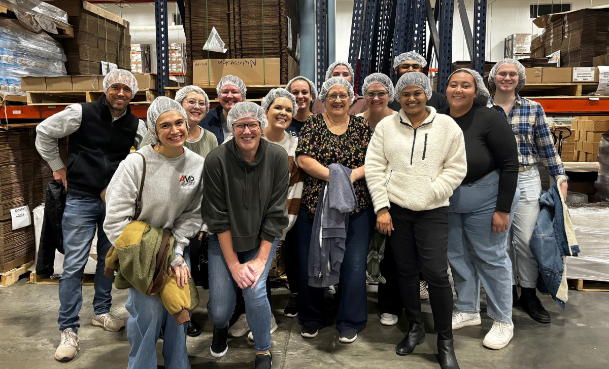 Team AMP Volunteers at Feed My Starving Children | American Marketing ...